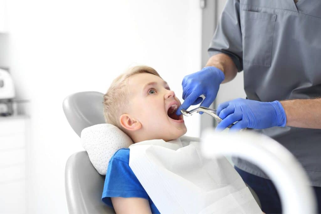 Painless Tooth Extraction Techniques For Children